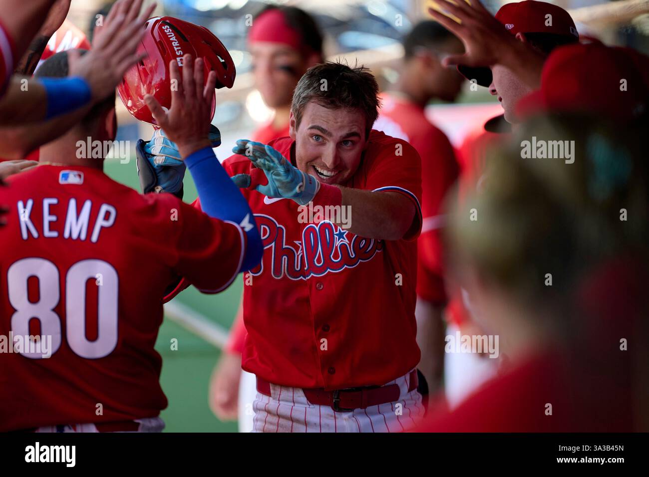 Philadelphia Phillies Carson DeMartini (31) high fives teammates after ...