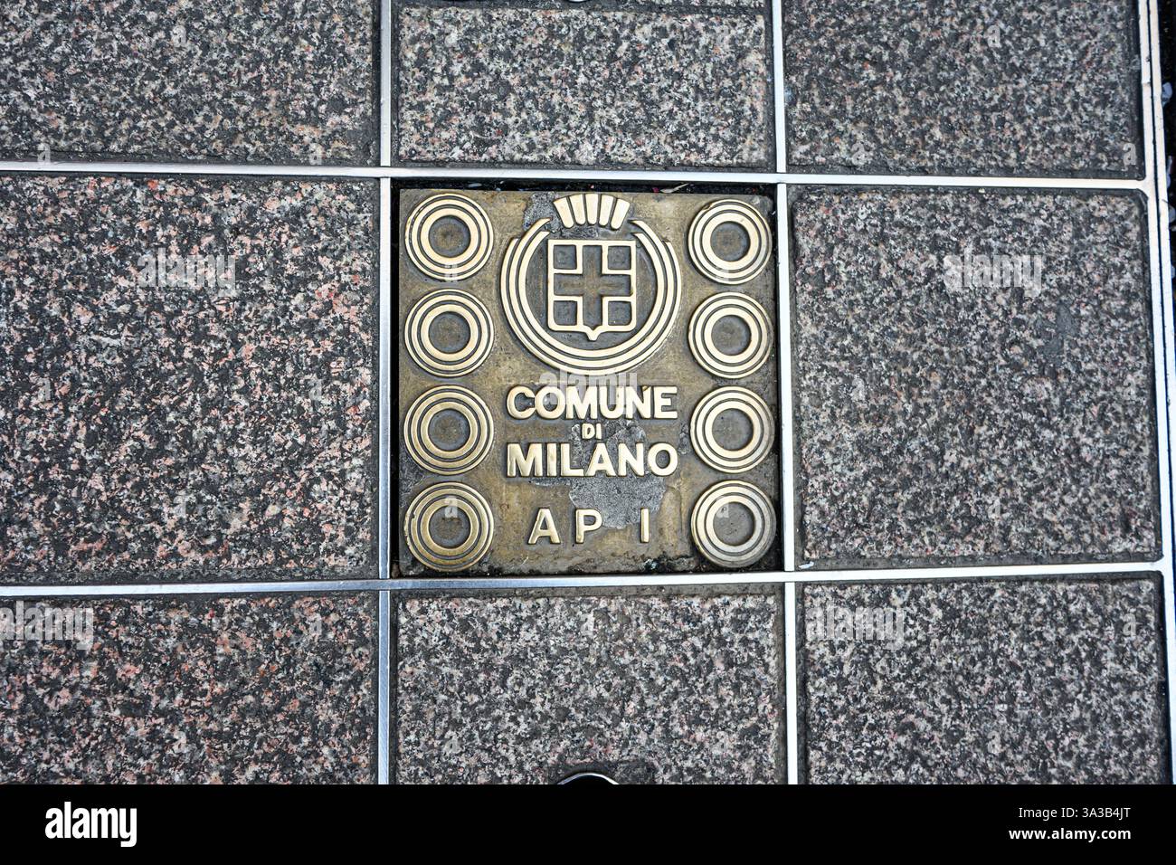 Comune di Milano (Municipality of Milan) mark on a manhole cover ...