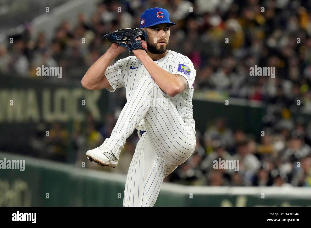 Chicago Cubs pitcher Julian Merryweather works against the Hanshin ...