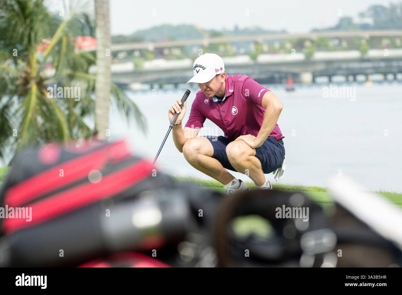 Tom McKibbin of Legion XIII reads his putt on the 15th green during the ...