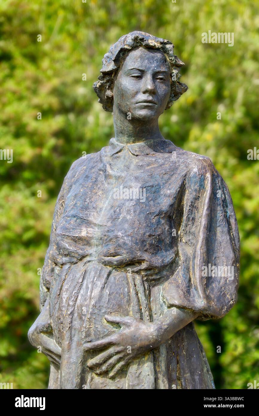Statue of a woman female convict in 19th century dress at historic ...
