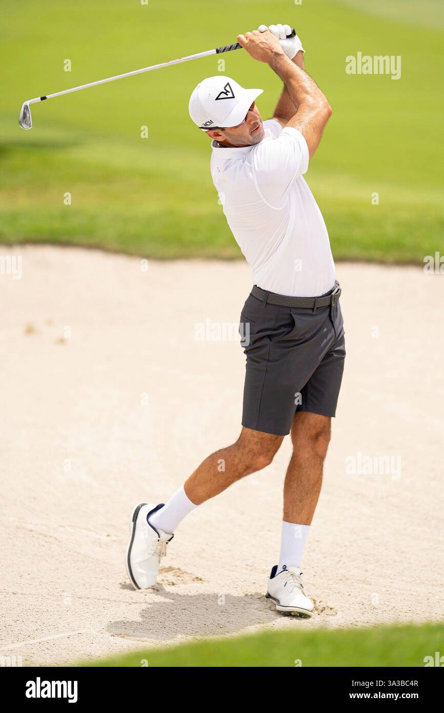 Cameron Tringale of HyFlyers GC hits his shot from a bunker on the 16th ...