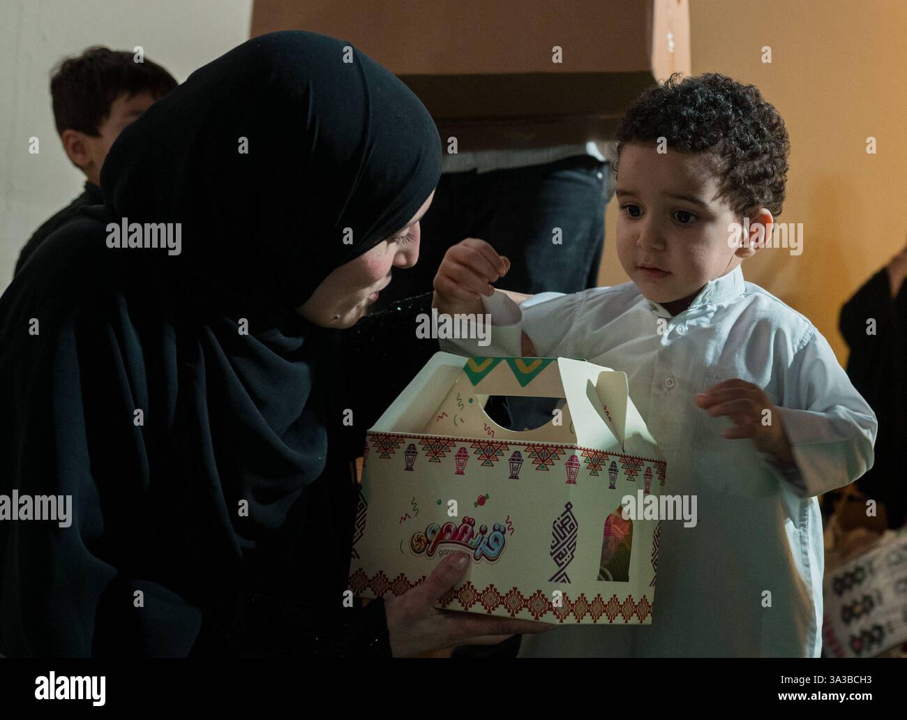 Doha Ramadan Garangao Festival 2025 A boy dressed in traditional ...