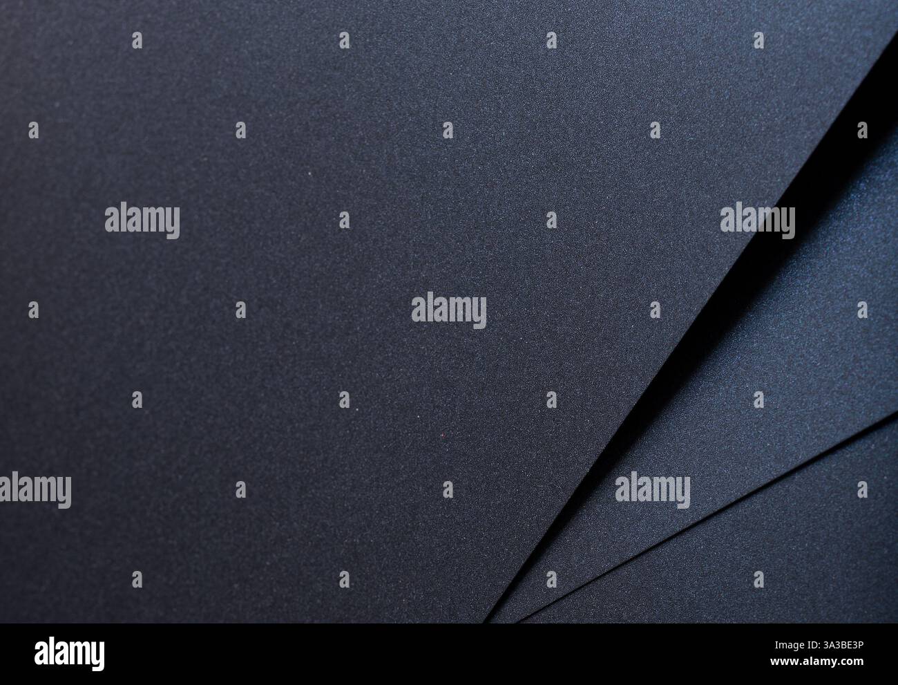 Navy blue paper background with a smooth texture and abstract geometric ...