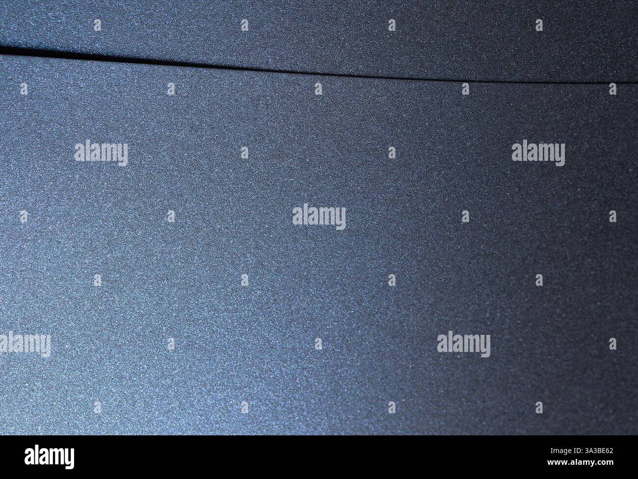 Navy blue paper background with a smooth, glossy texture and ...