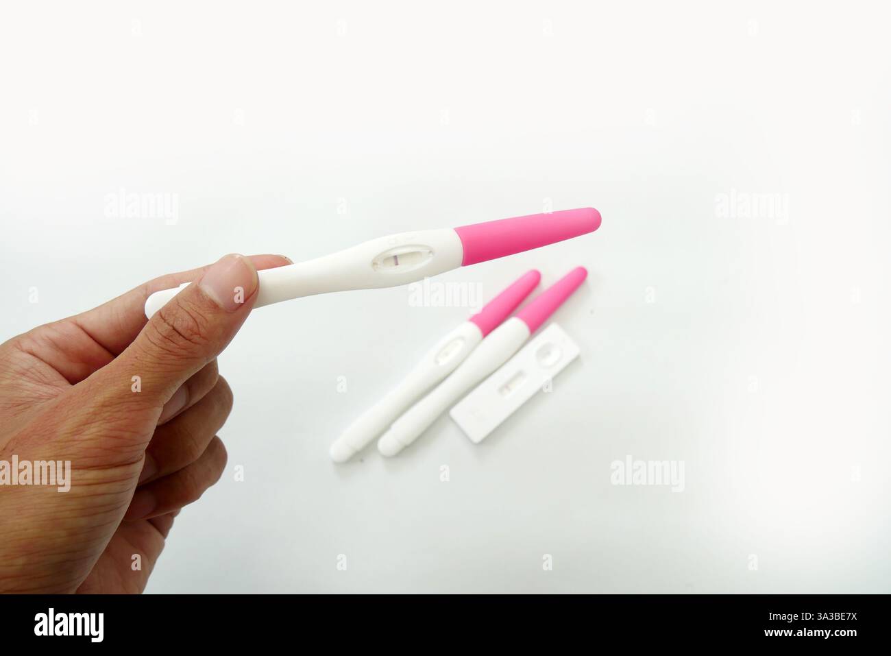 Hand holding Pregnancy Test tool one line sign of failed pregnancy ...
