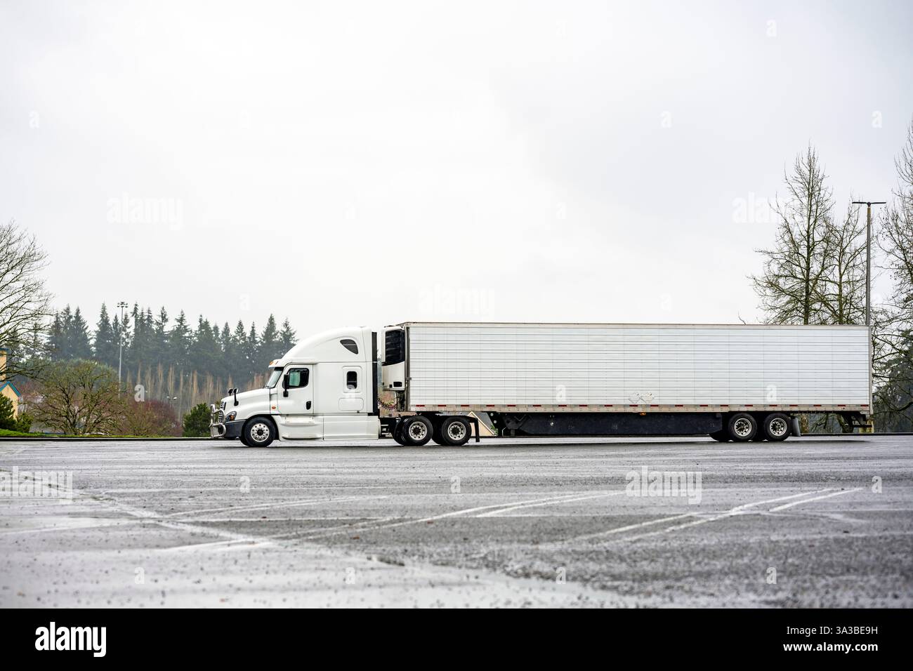 Industrial grade white big rig long haul semi truck with extended cab ...