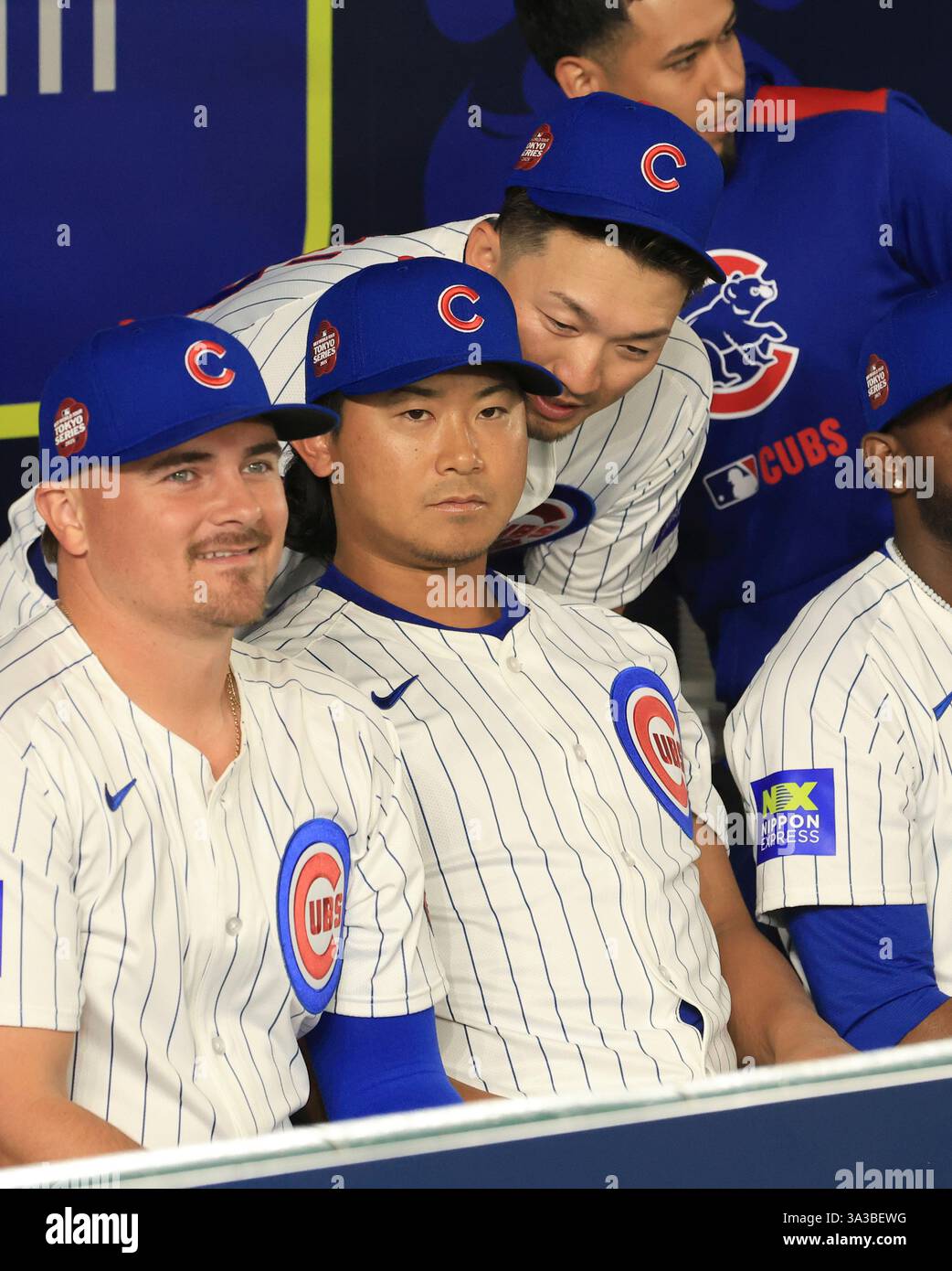 Chicago Cubs' Shota Imanaga (center left) and Seiya Suzuki (center ...