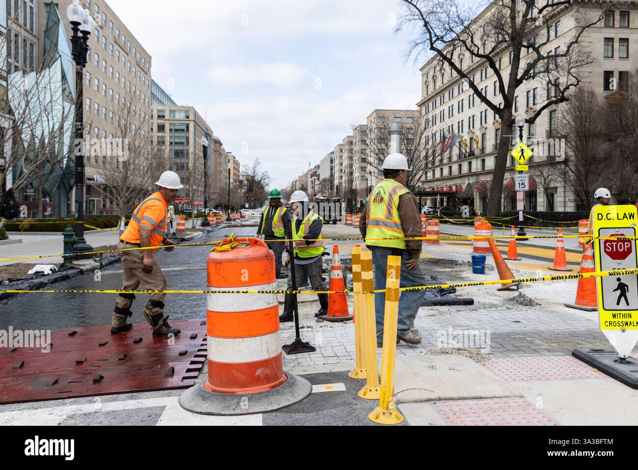 Washington DC, USA. 14th Mar, 2025. Work crews dismantle the "Black ...