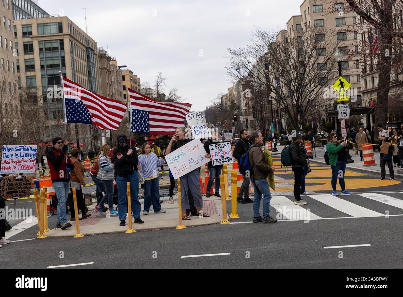 Protesters are seen while work crews dismantle the "Black Lives Matter ...