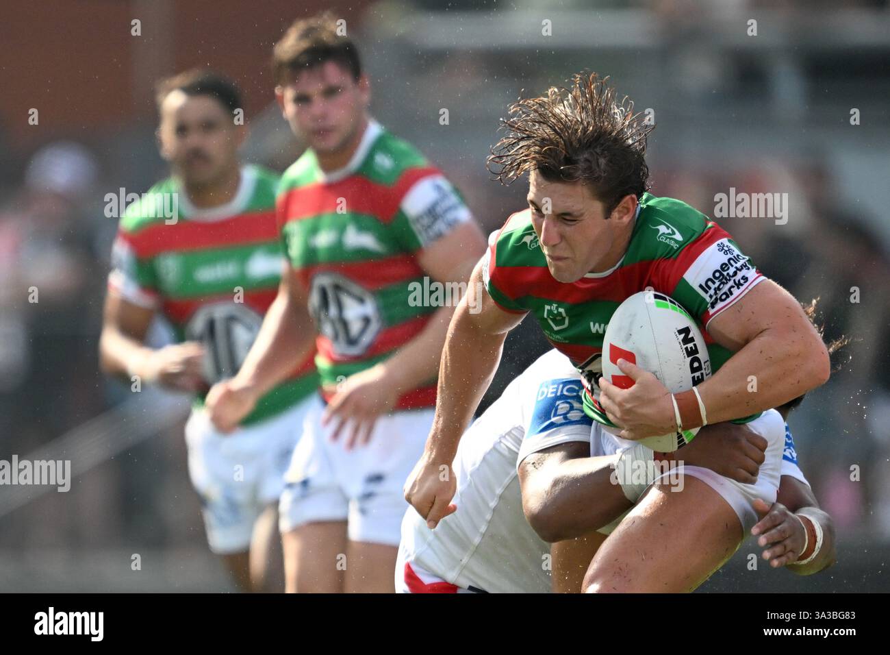 Jamie Humphreys of the Rabbitohs is tackled by during the NRL Round 2 ...