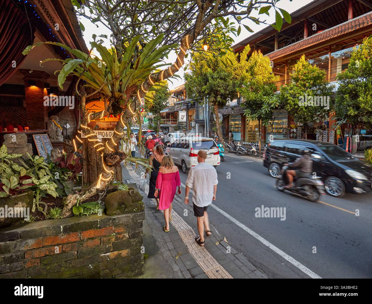 People walking down Jalan Raya Ubud, the main street in Ubud, Bali ...