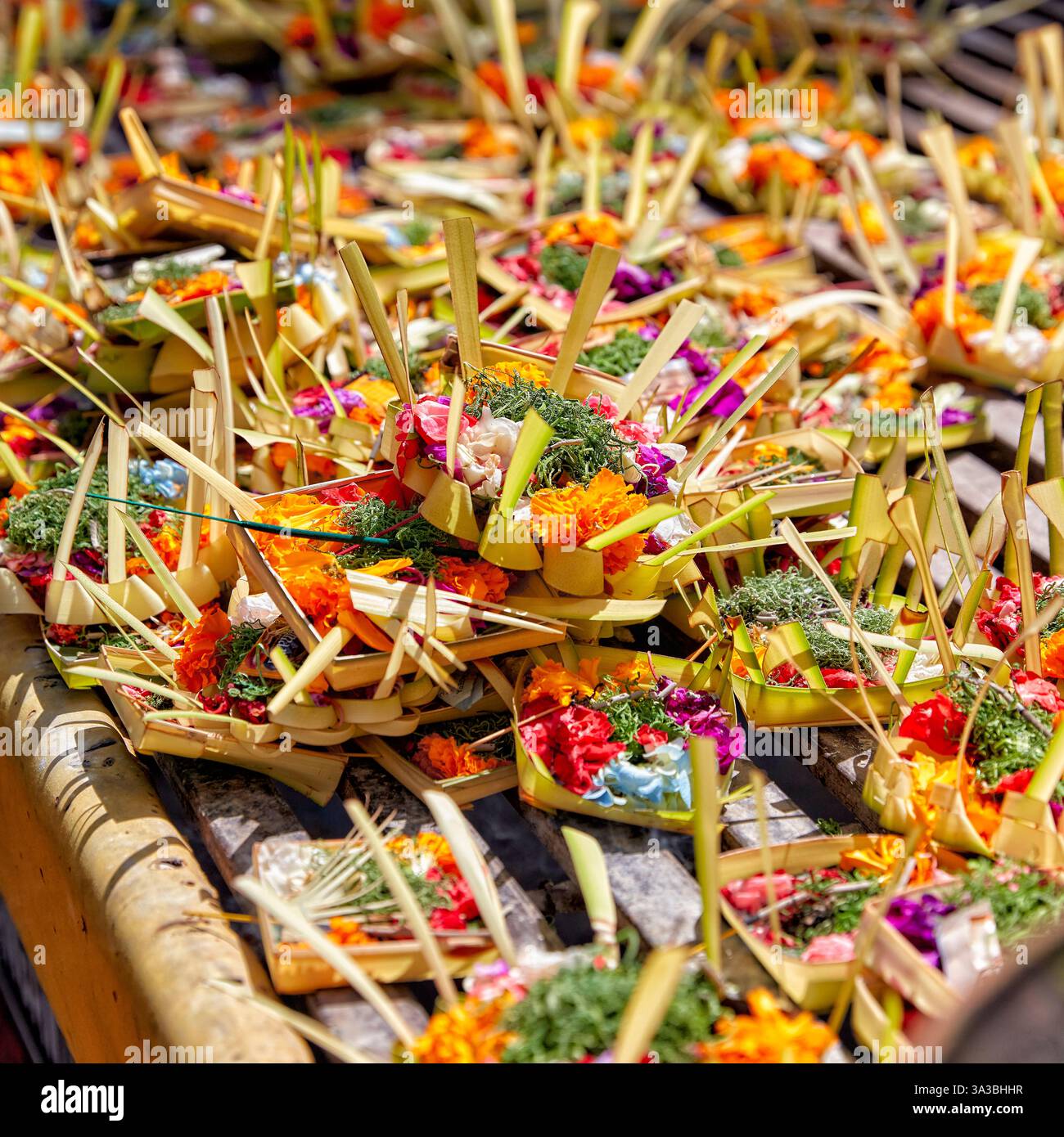 Close up of traditional Balinese offerings on an altar table at Tirta ...