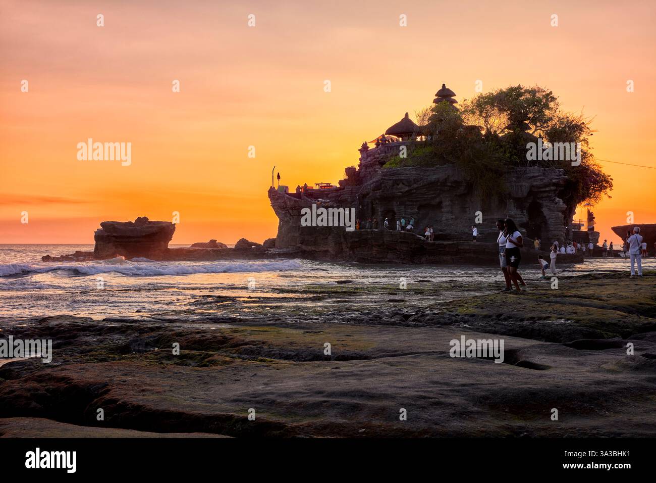 Exterior view of the iconic Tanah Lot island temple at sunset from the ...