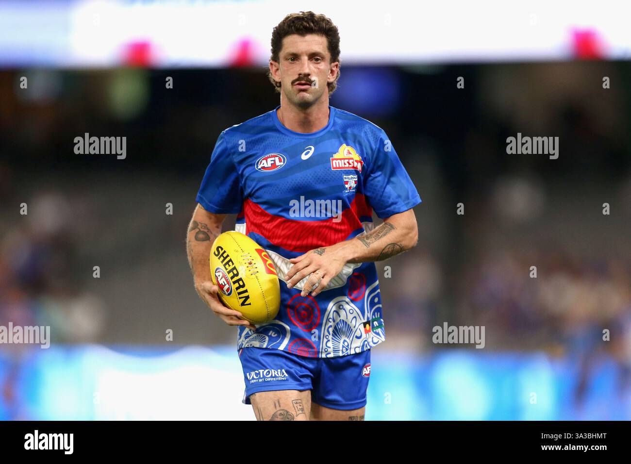 Tom Liberatore of the Bulldogs warms up prior to the start of the AFL ...