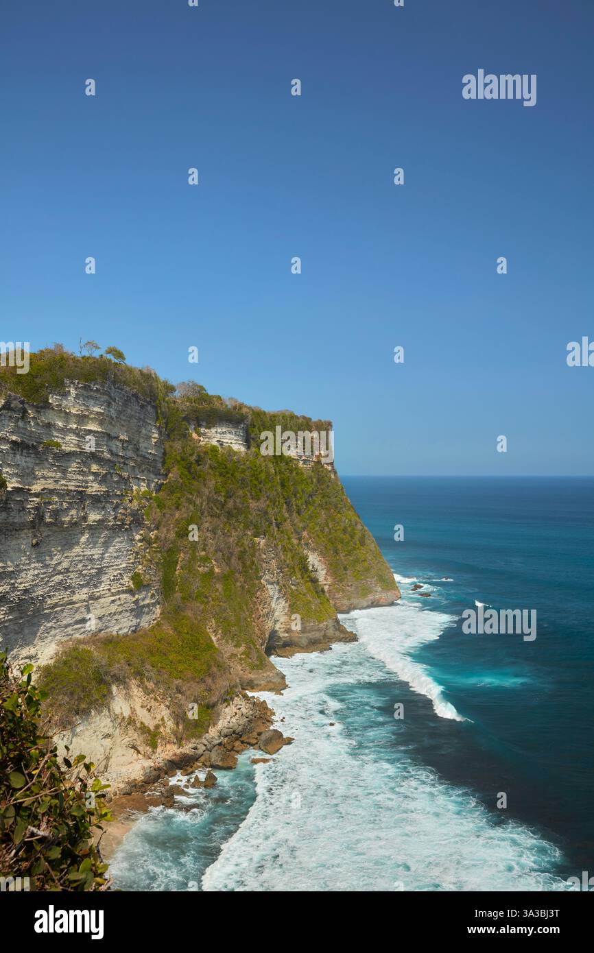 Elevated view of the iconic Uluwatu cliffs at Uluwatu Temple. Bukit peninsula, Bali, Indonesia ...