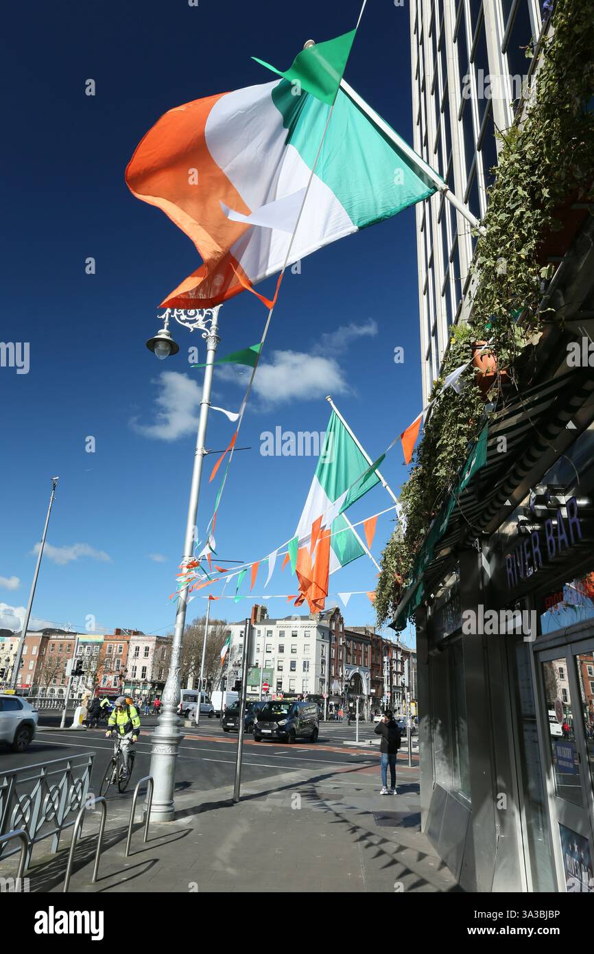 Dublin, Ireland - 12th March 2025 - Irish flags and bunting hang over a ...