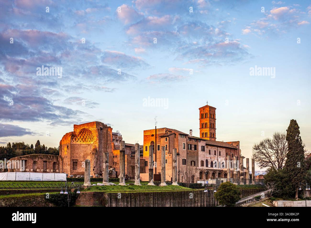 The temple of Venus and Rome ruins under a fiery sunrise sky. Photo ...