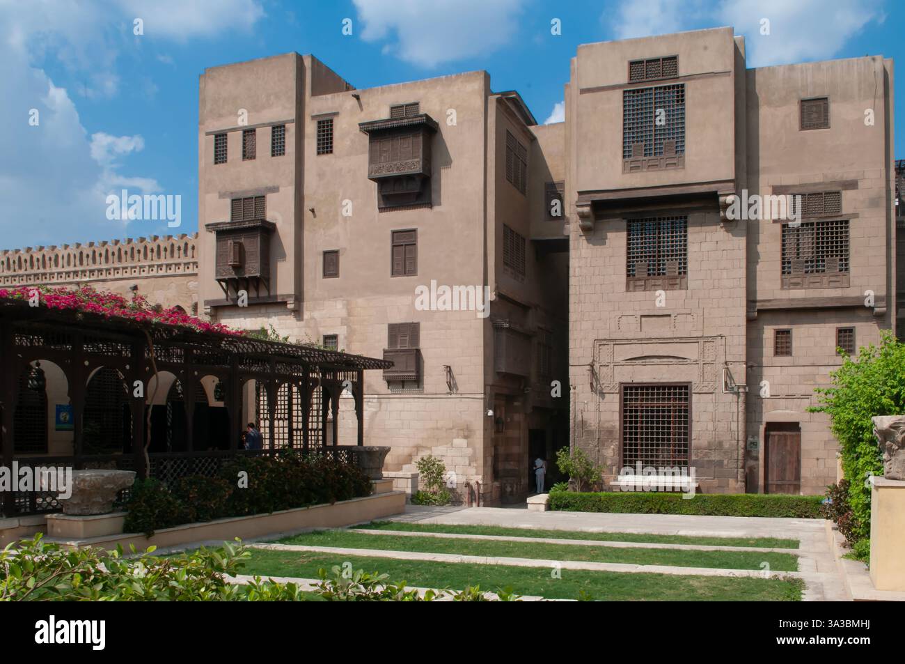 Egyptian style Mashrabiya oriel windows enclosed with carved wood ...