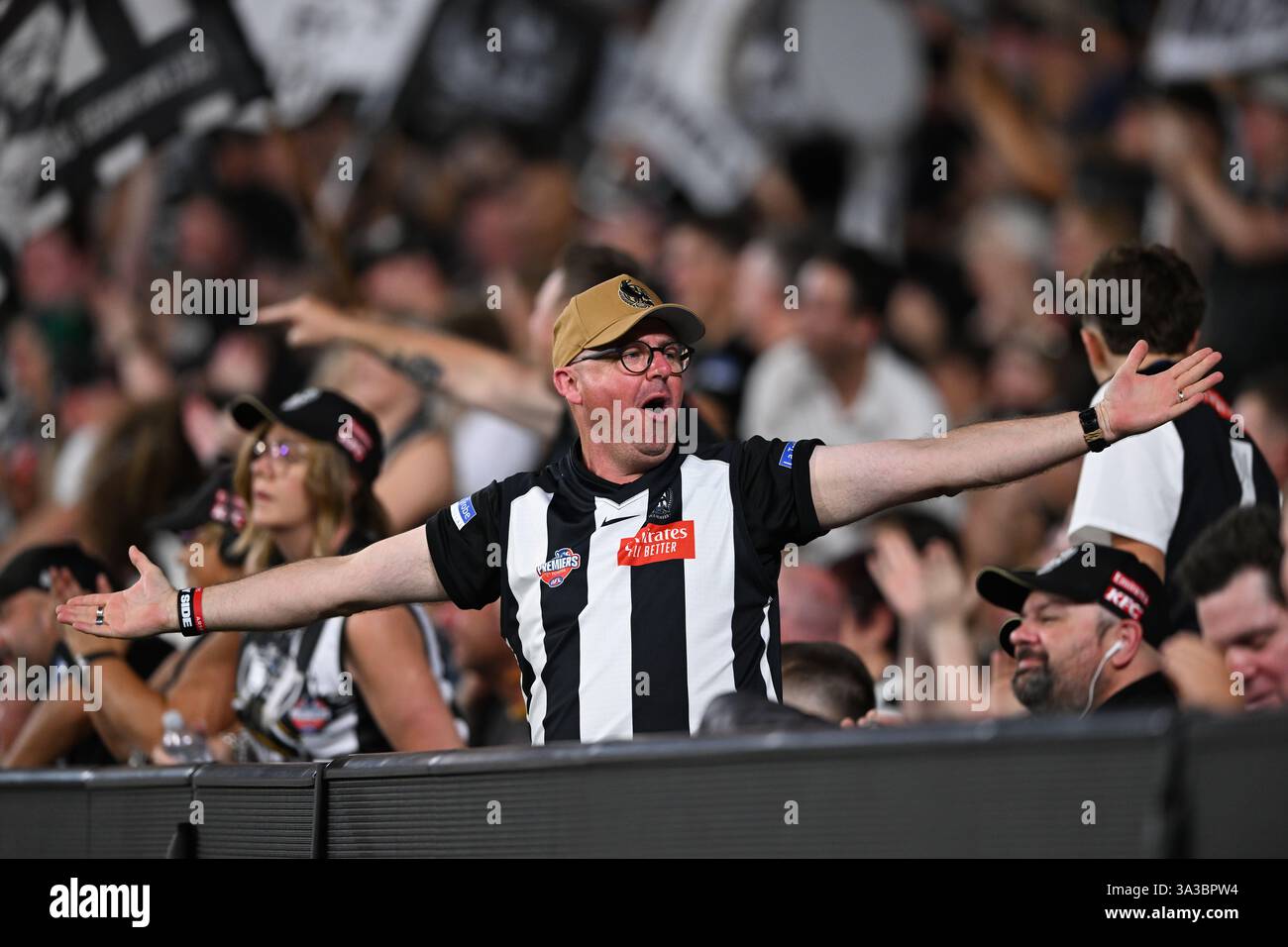 Melbourne, Australia. 15th Mar, 2025. A Collingwood fans show support ...