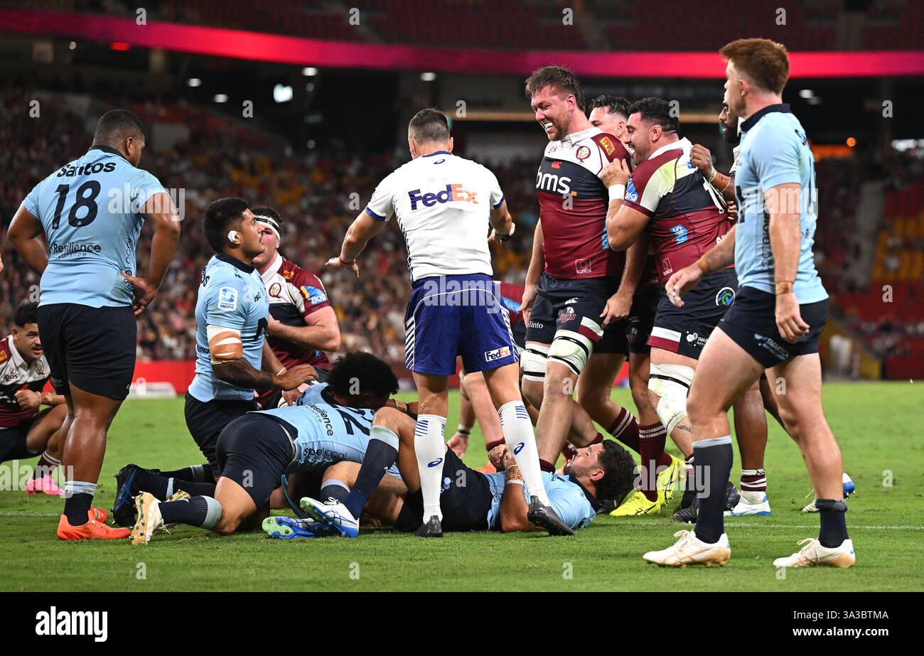 Brisbane, Australia. 15th Mar, 2025. Angus Blyth of the Reds (right ...