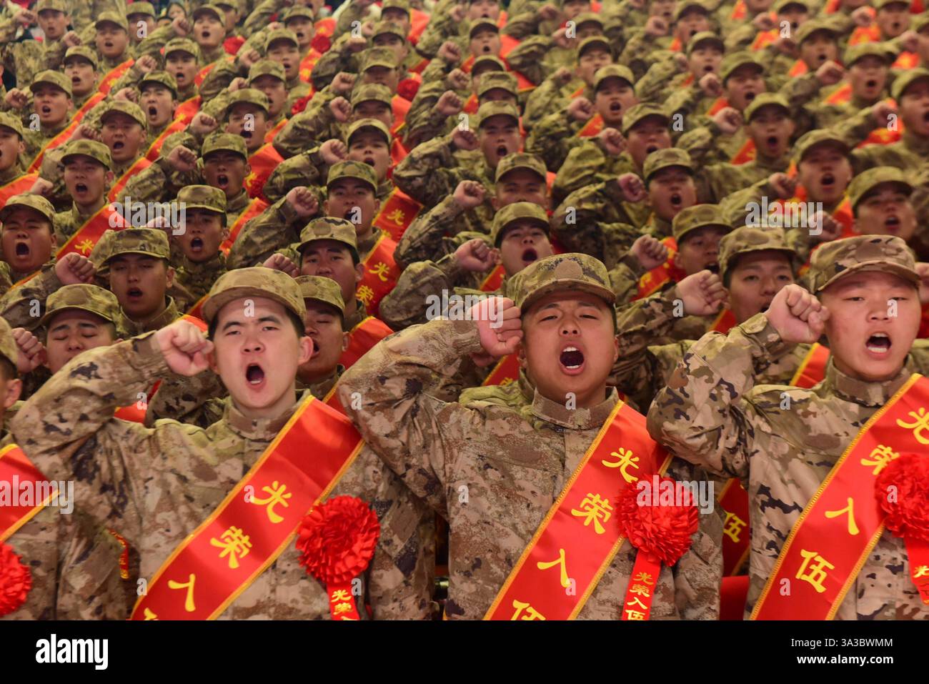 Newly drafted PLA soldiers pledge during a ceremony marking their ...