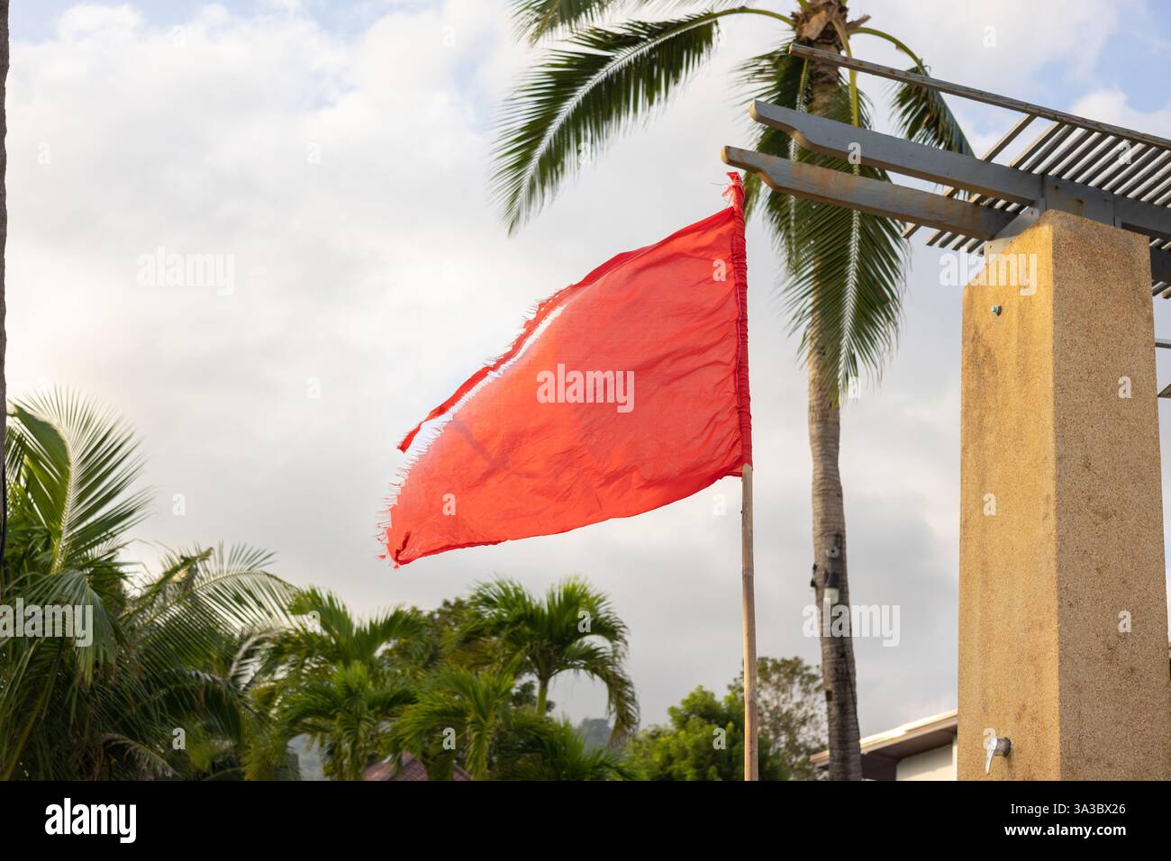 Tattered red warning flag hi-res stock photography and images - Alamy