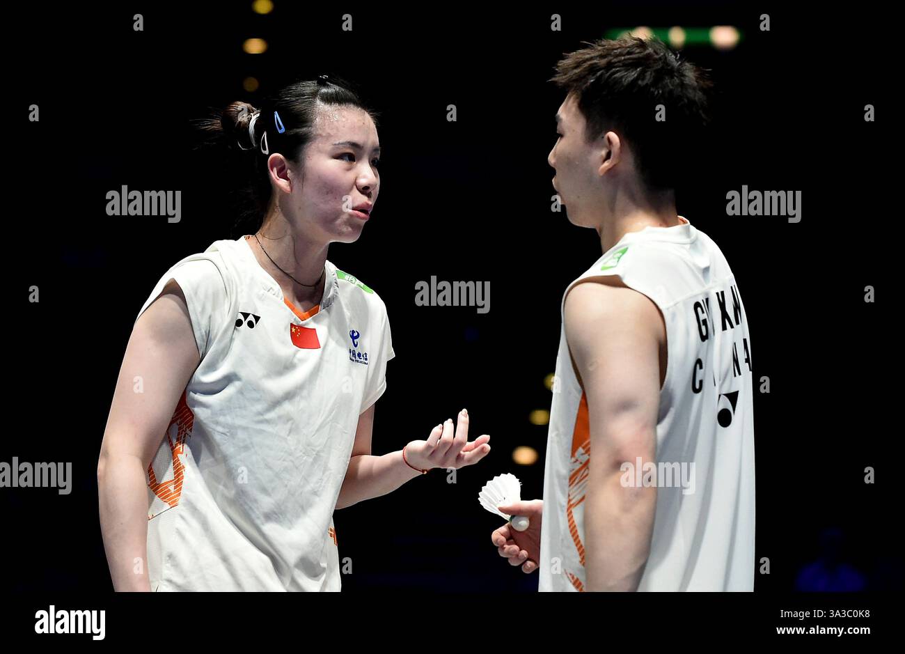 China's Guo Xin Wa and China's Chen Fang Hui, left, speak during the mixed doubles semi final ...