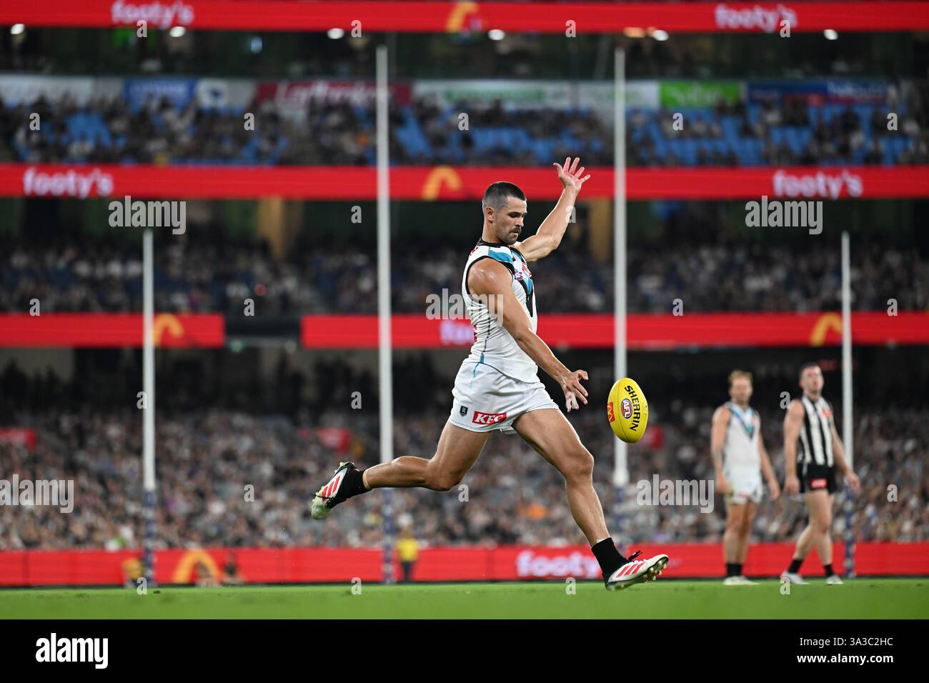 Melbourne, Australia. 15th Mar, 2025. Ryan Burton of Port Adelaide ...