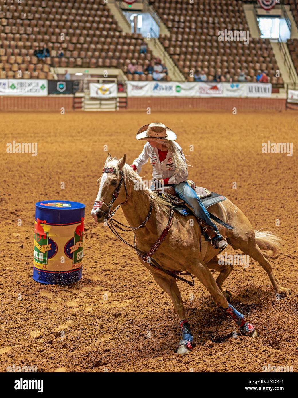 Women's barrel racing on horseback at the PRCA Rodeo Slack event in ...
