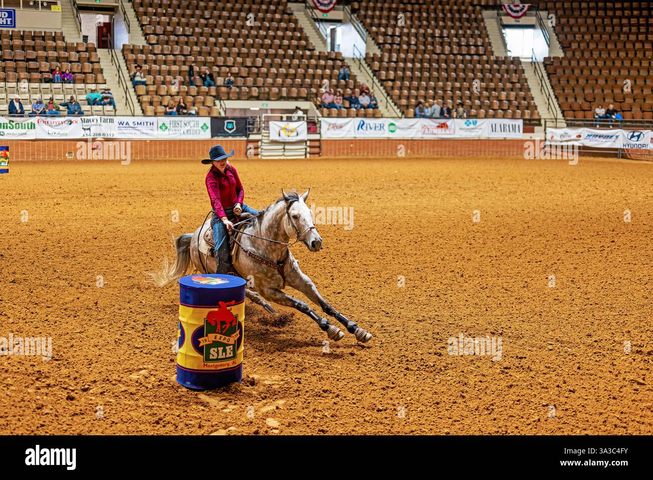 Women's barrel racing on horseback at the PRCA Rodeo Slack event in ...