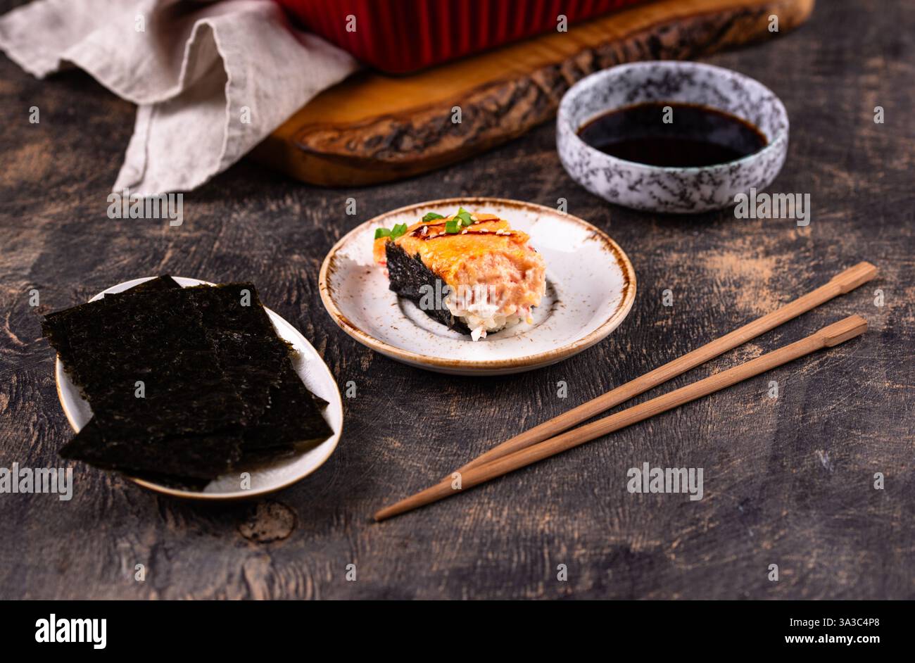 Baked sushi roll cake with crab surimi sticks Stock Photo - Alamy