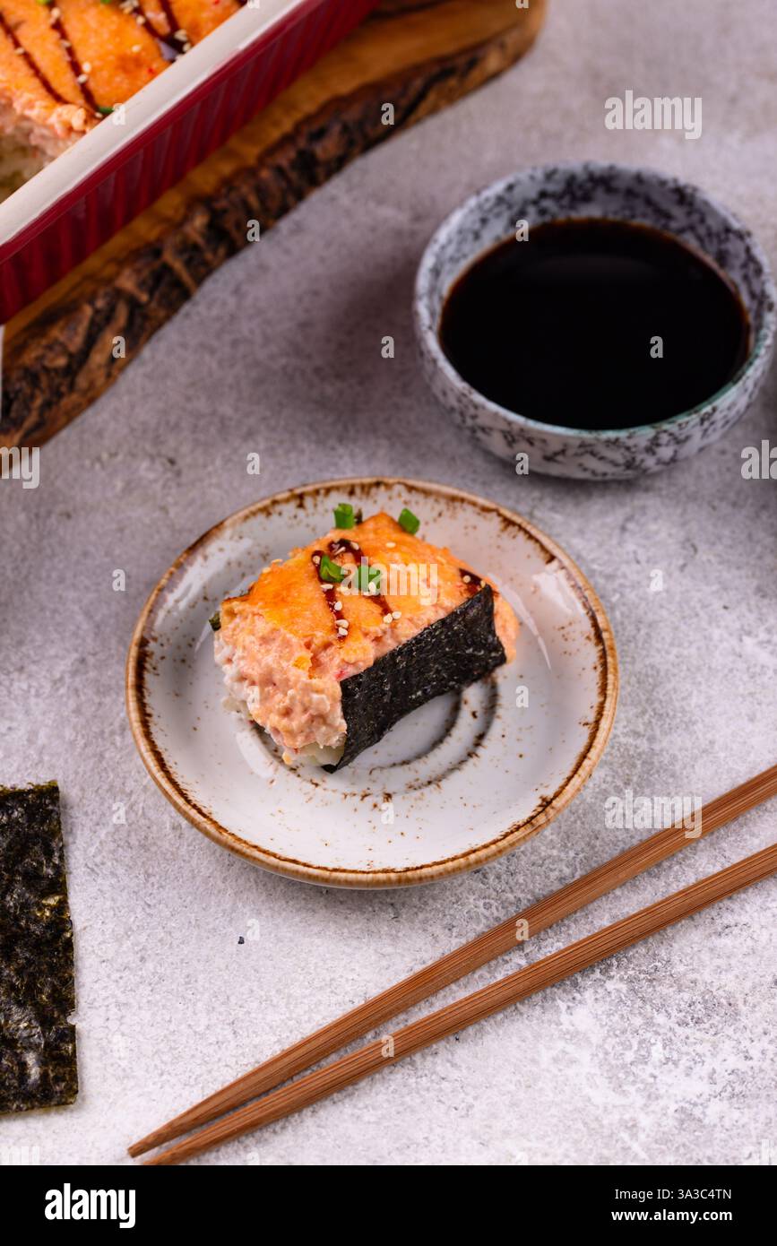 Baked sushi roll cake with crab surimi sticks Stock Photo - Alamy