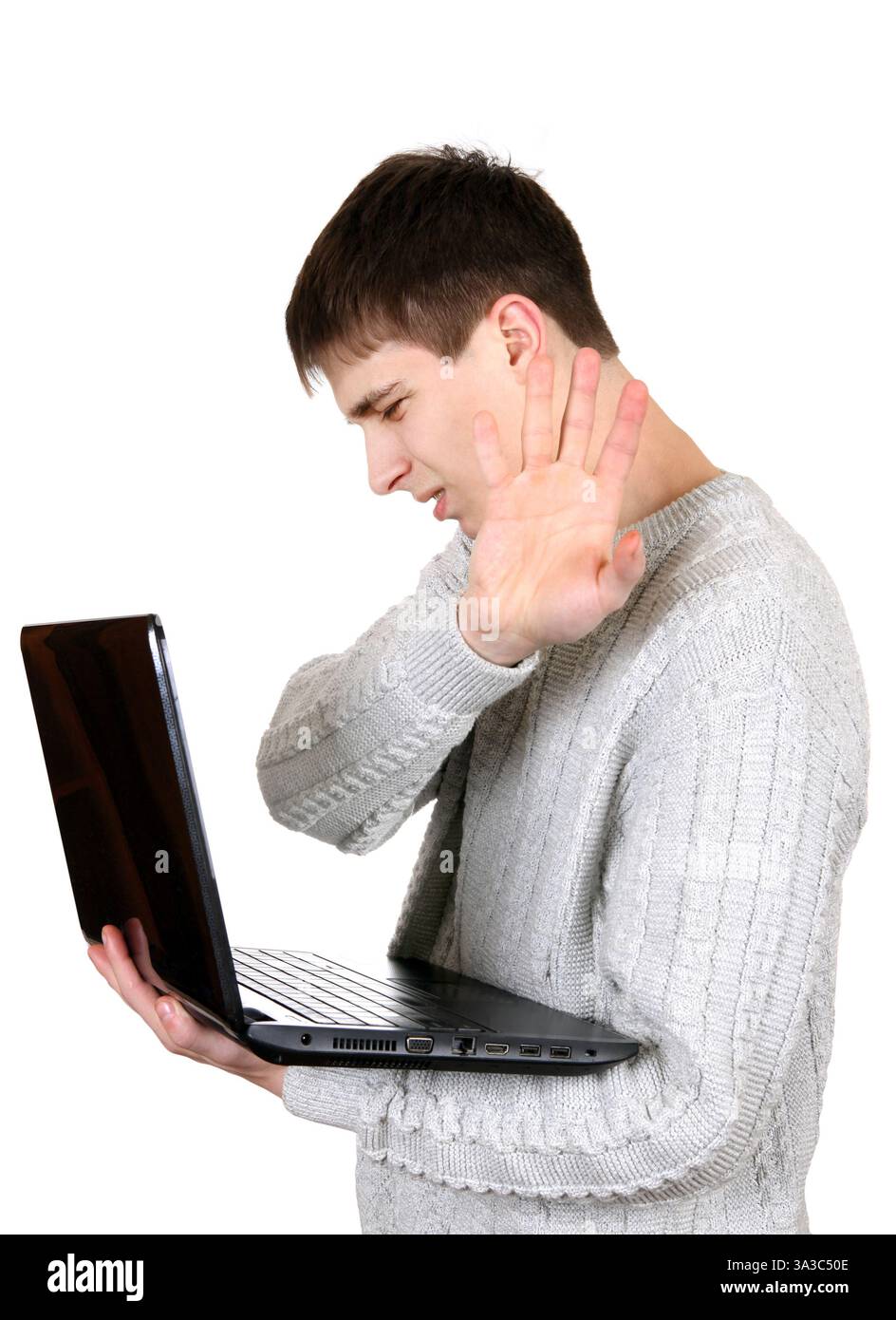 Busy Teenager with Laptop and wave away gesture Isolated on the White ...