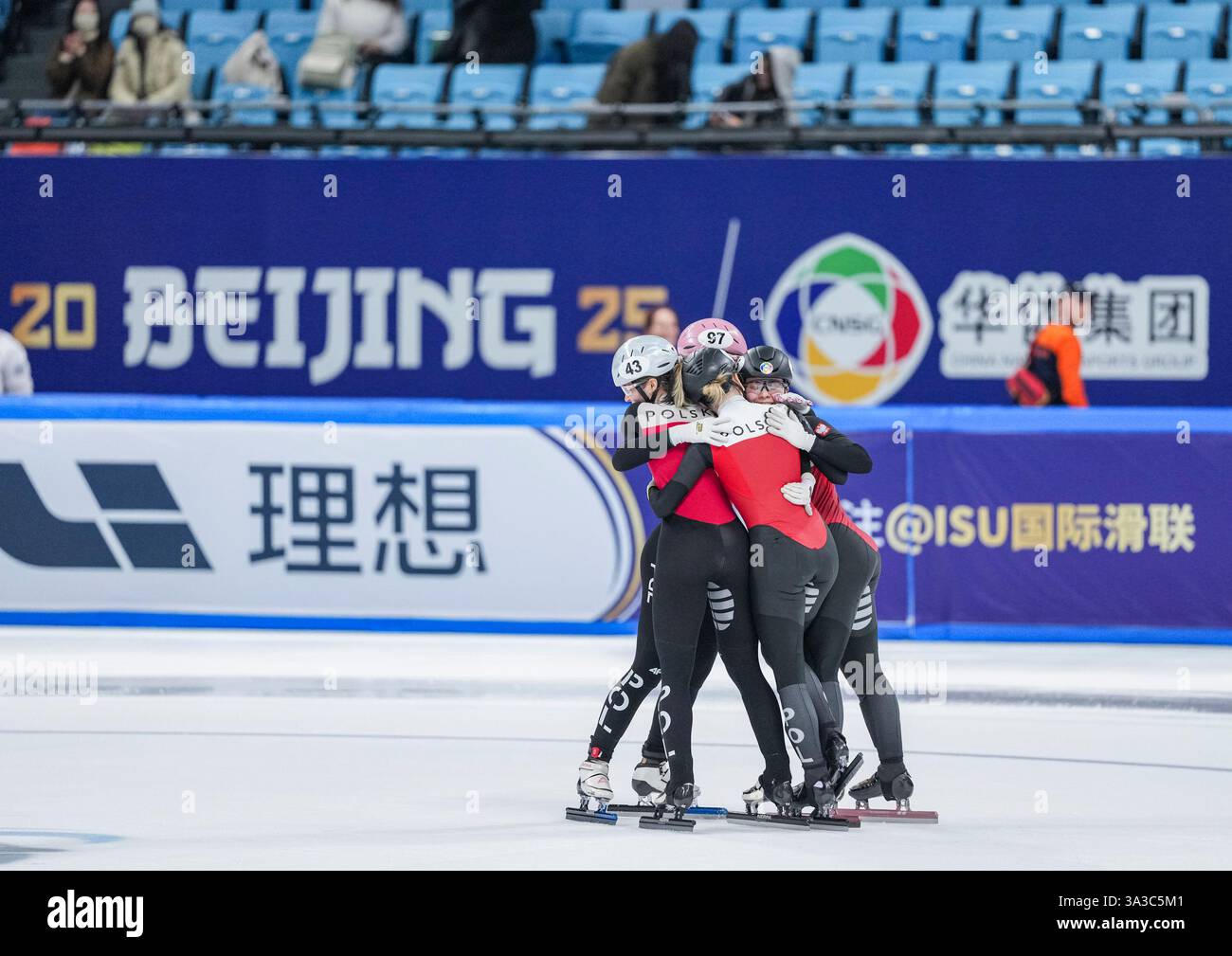 Beijing, China. 15th Mar, 2025. Team Poland celebrate after the women's 3000m relay final A at ...