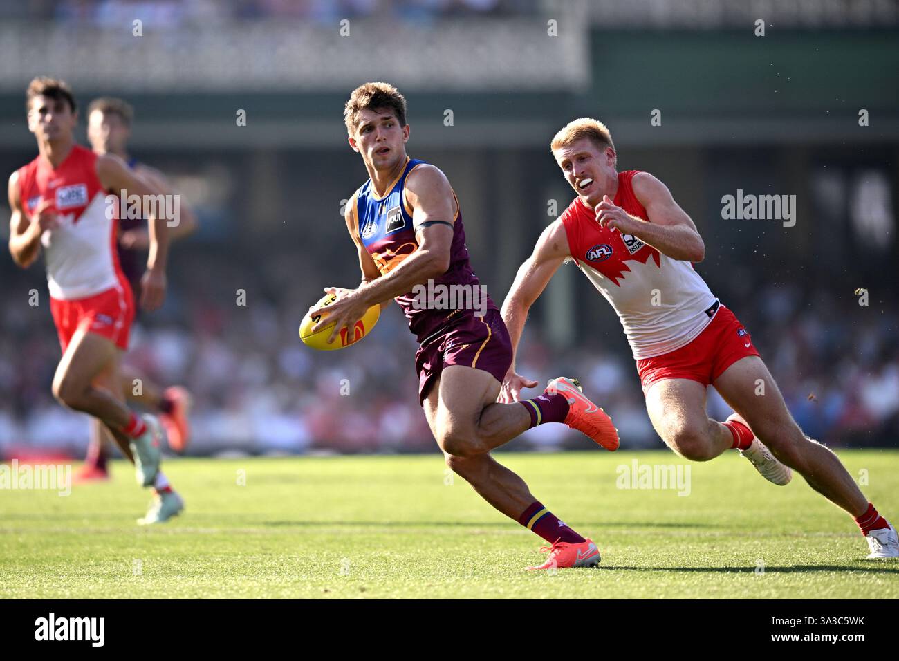 Sydney, Australia. 15th Mar, 2025. Zac Bailey of the Lions controls the ...