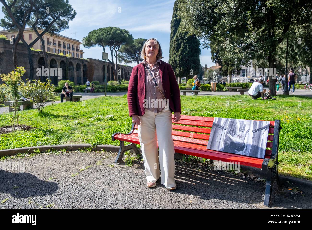 March 15, 2025, Rome, Rm, Italy: Four red benches are installed in the ...