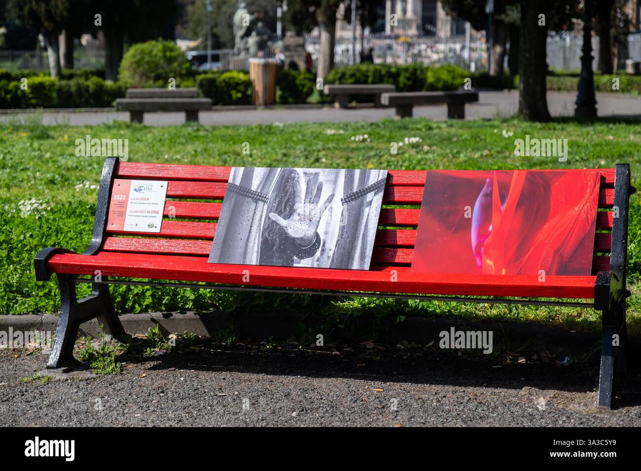March 15, 2025, Rome, Rm, Italy: Four red benches are installed in the Carlo Felice park, in ...