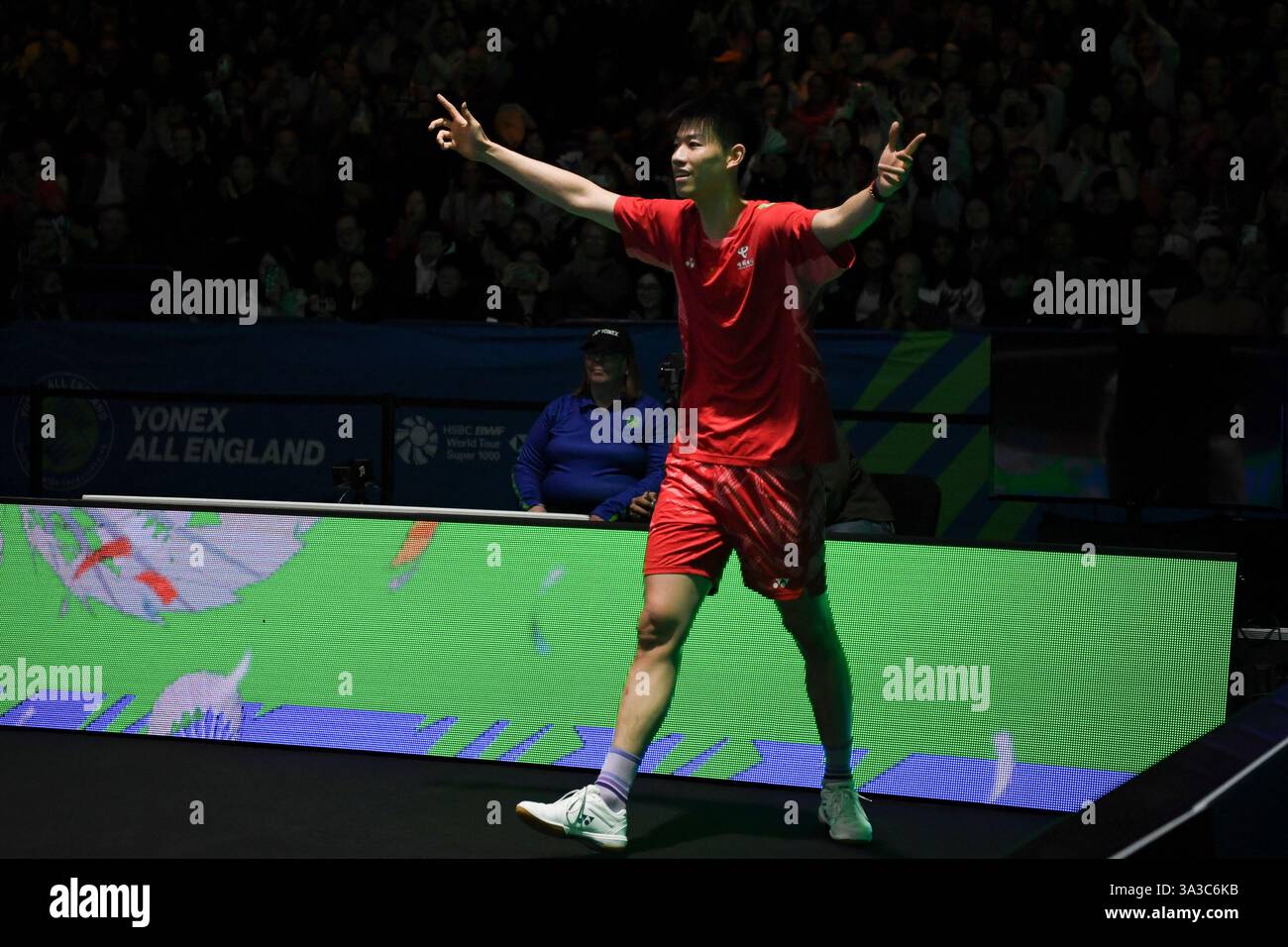 Feng Yan Zhe celebrates after winning the mixed doubles semi final ...
