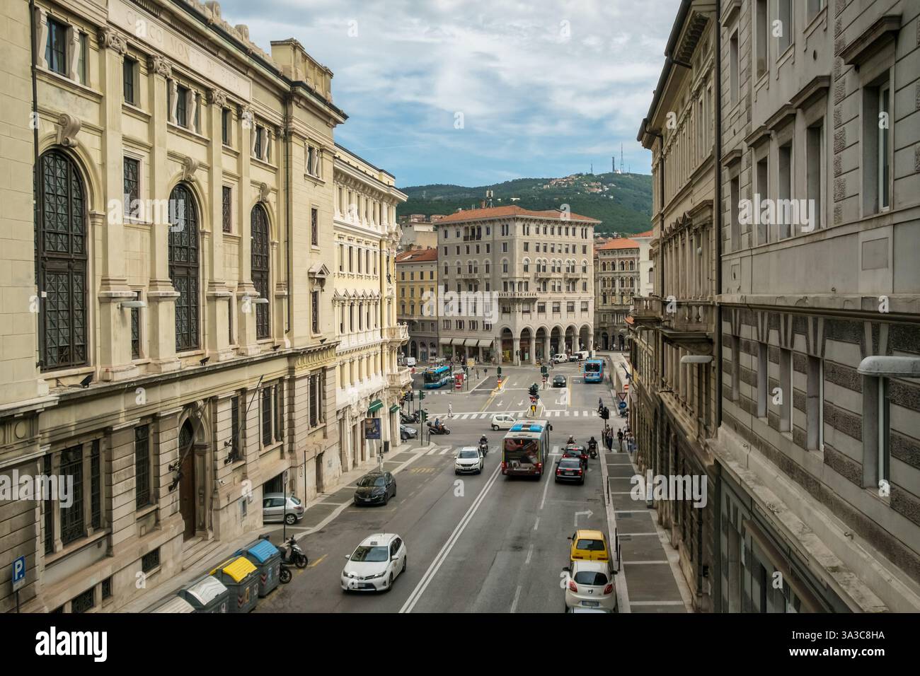 Vibrant city center of Trieste, Italy, featuring bustling streets lined ...