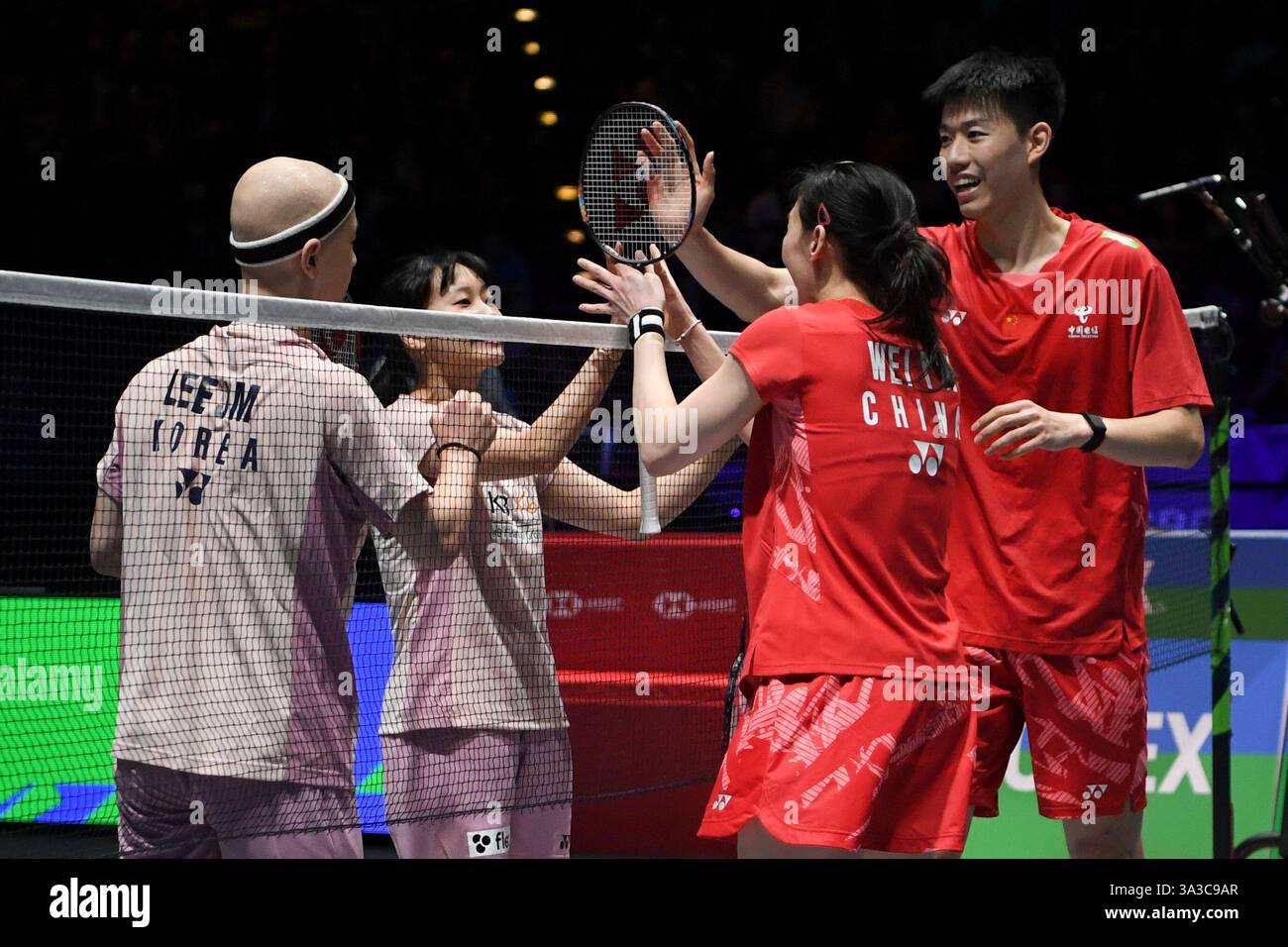 Feng Yan Zhe, right, and Wei Ya Xin of China are congratulated by Lee ...