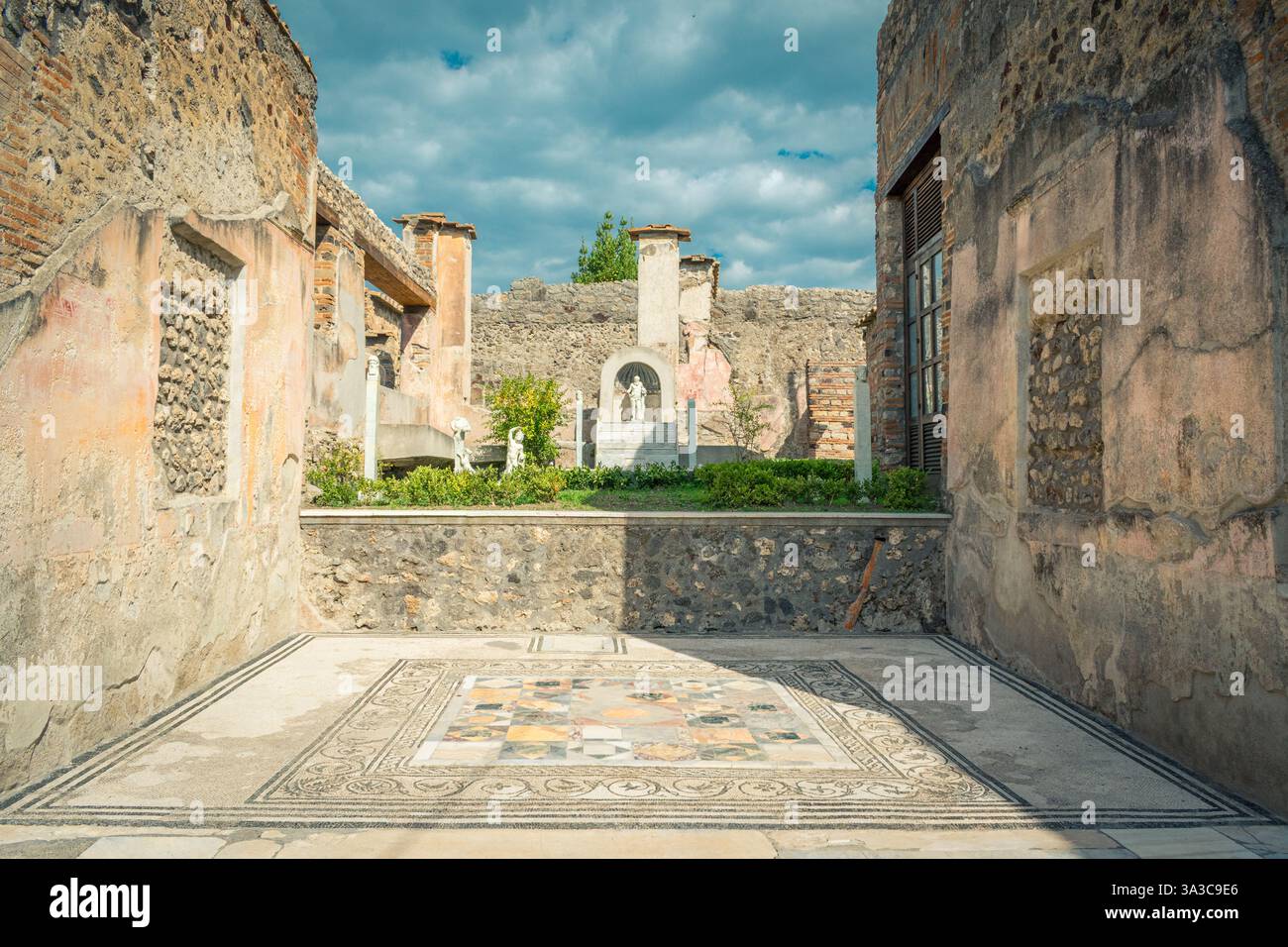 A detailed view of an ancient stone courtyard, featuring intricate ...