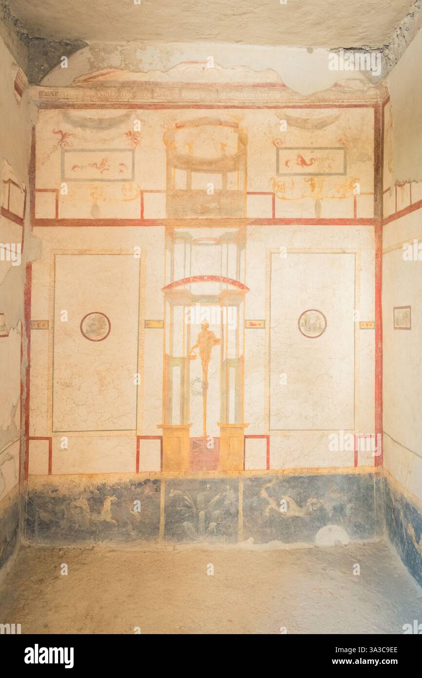 A detailed fresco decorates the wall of an ancient room, showcasing ...