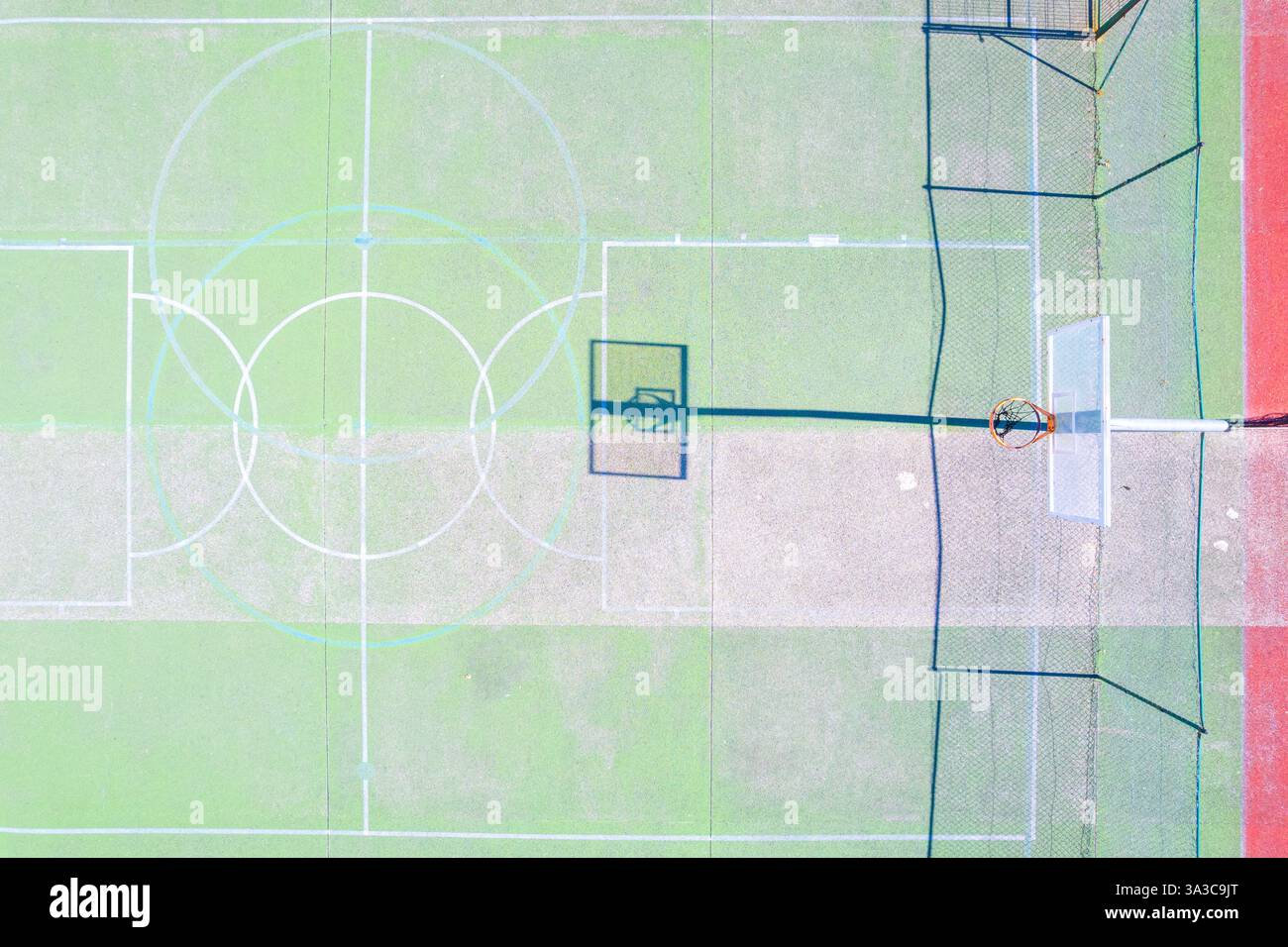 drone aerial zenithal view of basketball, tennis, futsal and handball ...