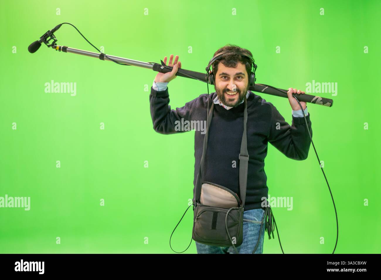 Boom microphone operator testing hi-res stock photography and images ...