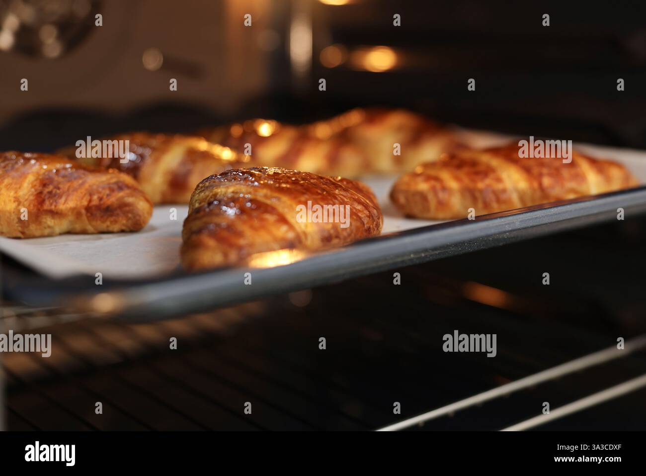 Process baking croissants in oven hi-res stock photography and images ...