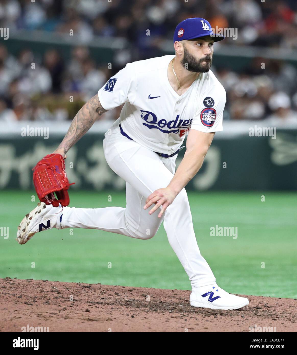 Los Angeles Dodgers' pitcher Tanner Scott pitches in the eighth inning ...