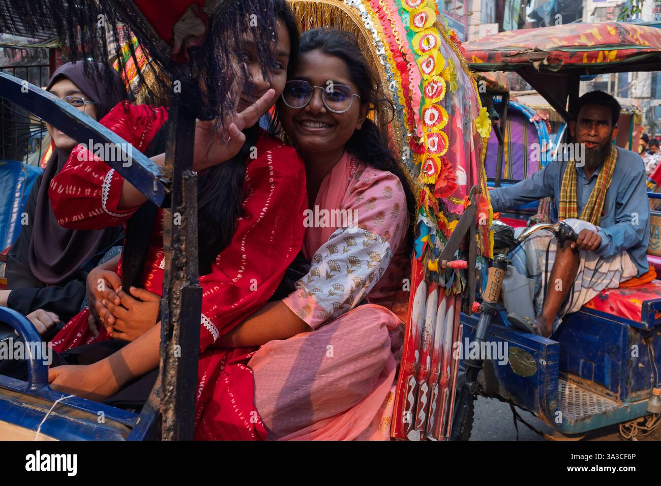 Happy local girls in a tuk tuk, Comilla, Bangladesh Stock Photo - Alamy