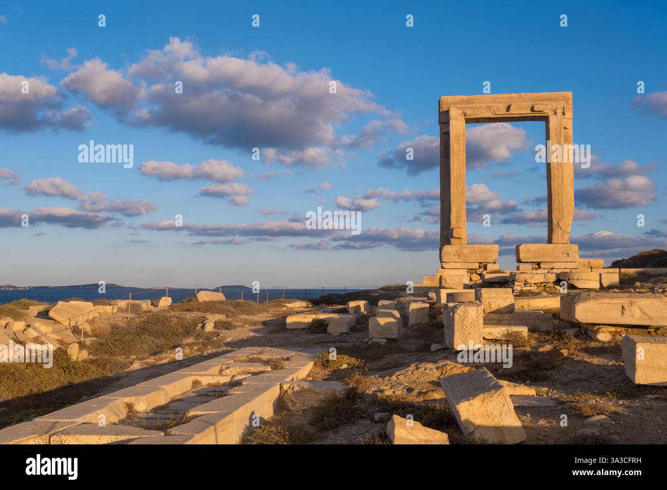 The iconic Portara stands among the ruins of the Temple of Apollo in ...