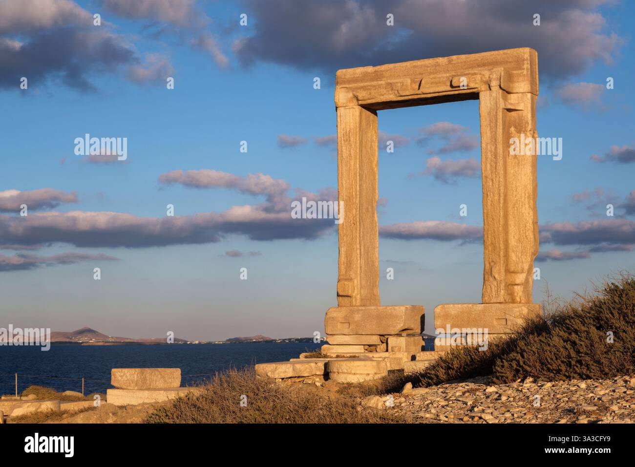 The iconic Portara stands among the ruins of the Temple of Apollo in ...